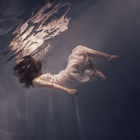 Girl With Long Hair Swims Underwater Stock Image Image Of Girl Long