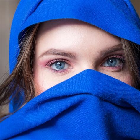 Premium Photo Portrait Of Woman Wearing Blue Scarf