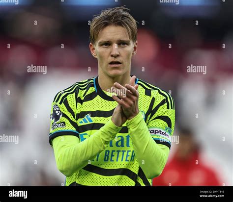Martin Ødegaard Of Arsenal Applauds The Travelling Fans After Arsenal