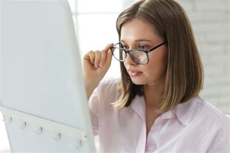 Woman With Poor Eyesight A Beautiful Girl Wears Glasses To Improve Her