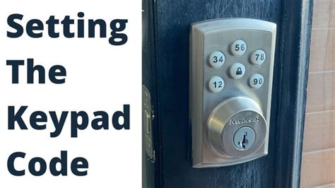 An Electronic Keypad Is Attached To A Door With The Words Setting The Keyboard Code