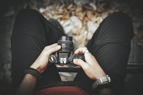Premium Photo Low Section Of Man Holding Camera