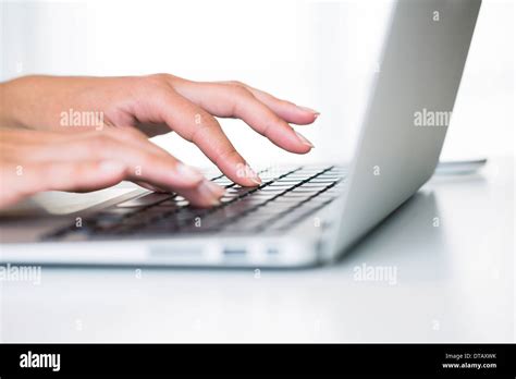 Close Up On Woman Hands Typing On Keyboard Laptop Computer Office