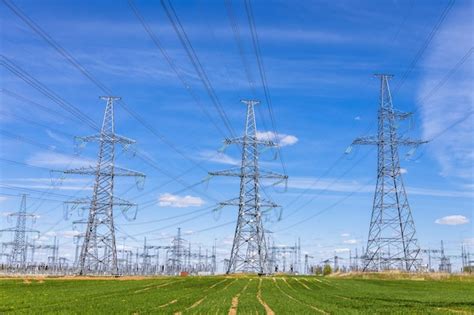 Premium Photo High Voltage Electricity Towers Transmission Power Lines Cables And Distribution