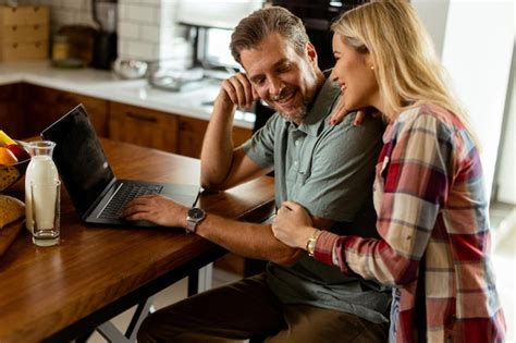 Premium Photo Cheerful Couple Enjoys A Lighthearted Moment In Their