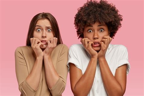 Free Photo Scared Beautiful Girl Looks With Frightened Expression