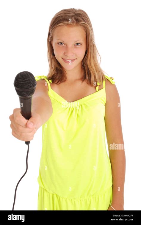 Happy Young Beautiful Girl Singing With Microphone Isolated On White