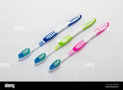 Three Different Colored Manual Toothbrushes White Background Symbol
