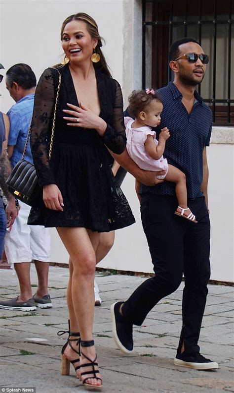 Chrissy Teigen Almost Exposes Her Bosom In Plunging Dress Daily Mail