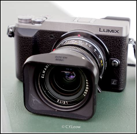 Man Behind Lens Lumix Gx85 With Mf Prime Lens