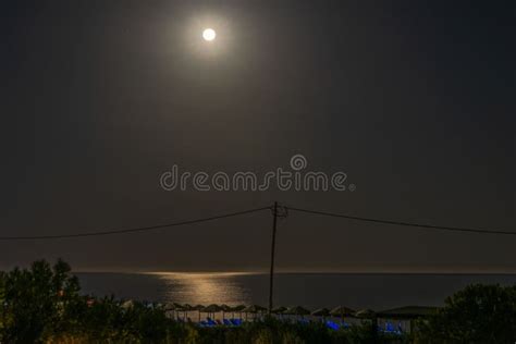 Nighttime Beach With Moon Illuminating Mediterranean Sea Casting