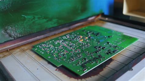 Slow Motion Clip Showing Whole Vivid Green PCB Printed Circuit Board