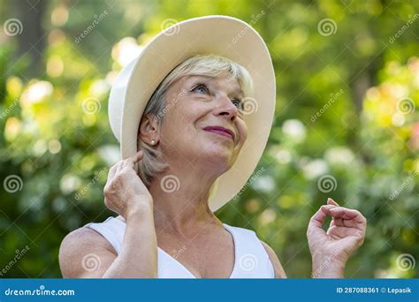 Emotional Portrait Of A Woman 60 70 Years Old Beautiful Blonde In A