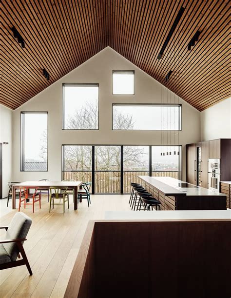 Wooden Cabin With Split Levels And Charcoal Brick Exterior