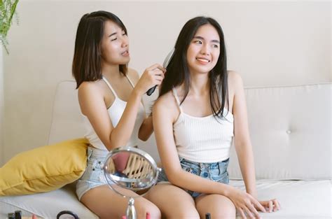 Premium Photo Portrait Of Asian Lesbian Women Couple Combs Girlfriend