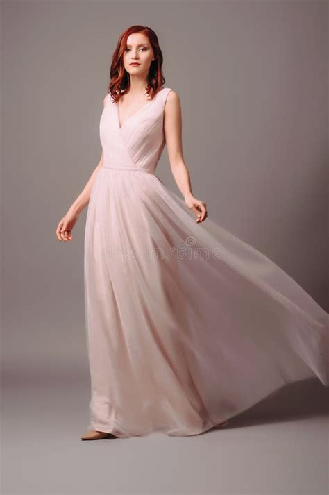 Seductive Ginger Woman Walking In Criss Cross Pink Tulle Wedding Dress Attractive Young Redhead