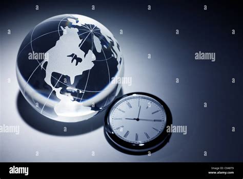 Globe And Clock For Background Stock Photo Alamy
