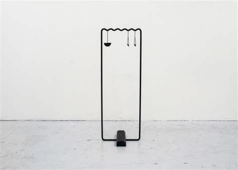 wave shaped clothes rails keep items evenly spaced
