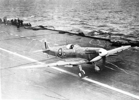 Asisbiz Fleet Air Arm NAS Seafire IIc Red B MB Taking Off From Its Assigned Carrier Feb