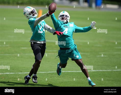 Miami Dolphins Cornerback Cam Smith 24 And Cornerback Kader Kohou 4