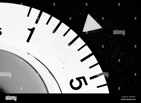 Monochrome Close Up Of An Analog Laboratory Timer Set To Three Stock