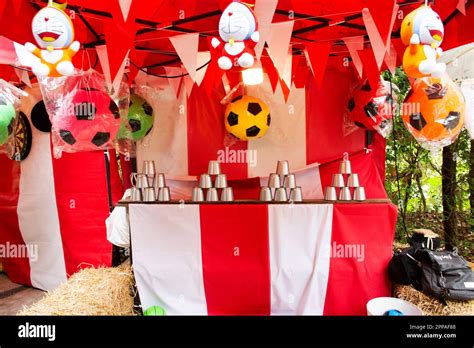 Antique Game Throwing And Shooting Balls To Cans Knockdown Of Local Carnival Funfair Festival