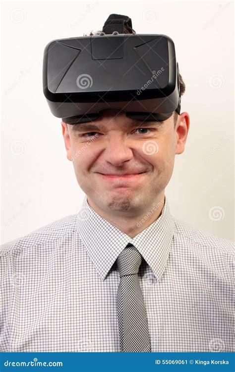 A Nauseous Dizzy Disturbed Man Wearing Oculus Rift Vr Virtual Reality