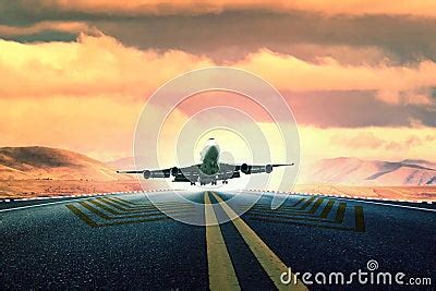 Large Passenger Plane Take Off From Airport Runway Stock Image