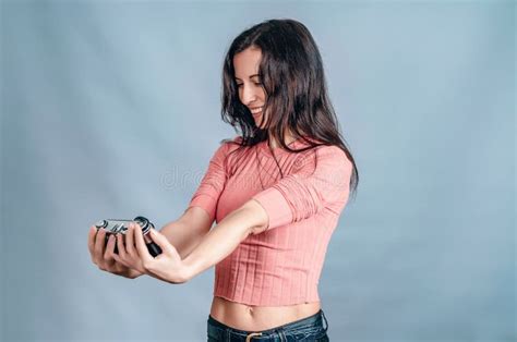 Cute Black Haired Woman Takes Selfie With Vintage Camera Stock Image