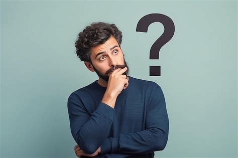 Confused Man Thinking In A Thoughtful Pose With Question Mark Choice