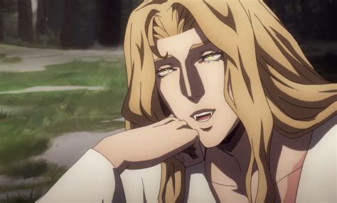 A Woman With Long Blonde Hair And Green Eyes Looks At The Camera While