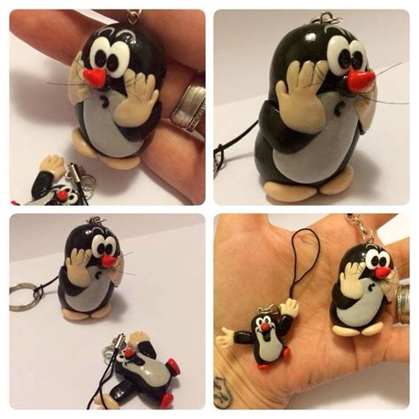 Four Different Pictures Of A Penguin Keychain