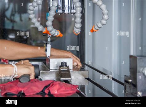Man Set Up Dial Gauge For Setting Balance Work After Cutting Of Cnc