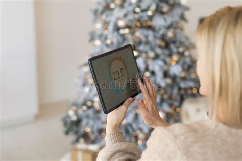 Modern Home Smart Automation App On Tablet Display In Woman Hands At