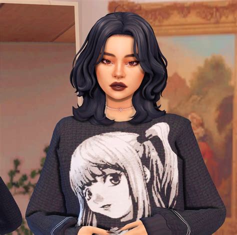A Woman With Black Hair Holding A Nintendo Wii Game Controller In Front