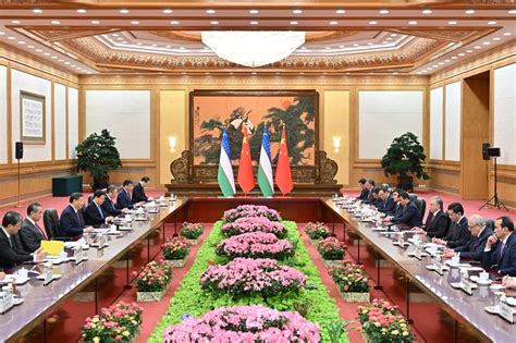 习近平同乌兹别克斯坦总统米尔济约耶夫会谈中国政府网