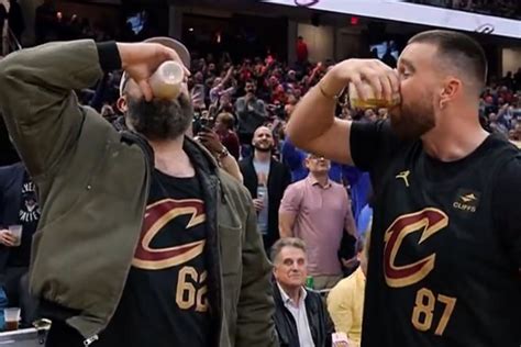 Travis And Jason Kelce Chug Beers Served By Cavaliers Mascot