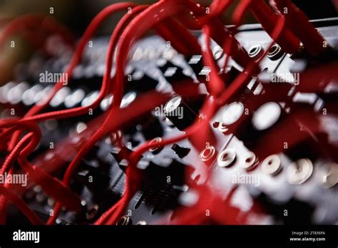 Analog Modular Synthesizer Board Connected With Wires In Sound