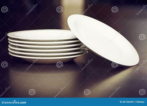 Plates On A Table Stock Image Image Of Crockery Heap 26136549