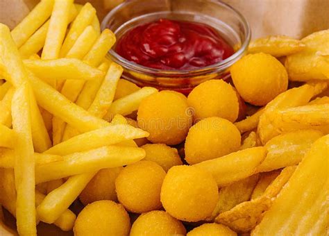 Different Types Of Fried Potatoes Such As French Fries Roast Potatoes And Potato Balls Stock