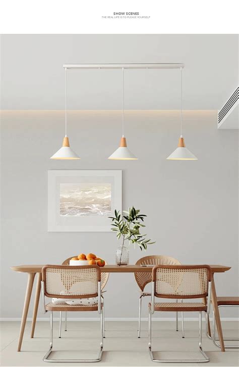 餐厅吊灯现代简约餐厅灯餐桌饭厅吧台灯具侘寂风创意三头北欧吊灯 天猫 花瓣网