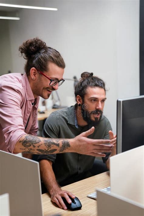 Software Engineers Working On Project And Programming In Company Stock