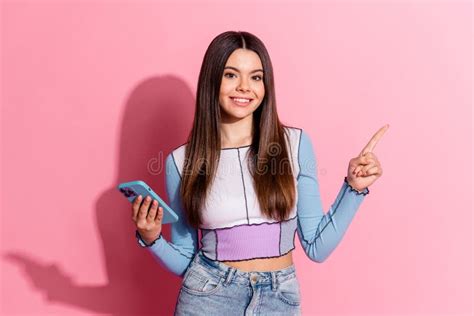 Photo Of Lovely Charming Girl Wear Trendy Clothes Hold Gadget Empty