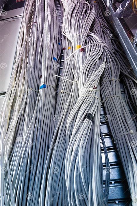 Bunch Of Network Cables In Wave Pattern Leading Across Server Ro Stock