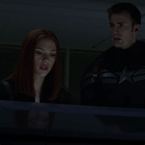Captain America The Winter Soldier And Black Widow Are Looking At