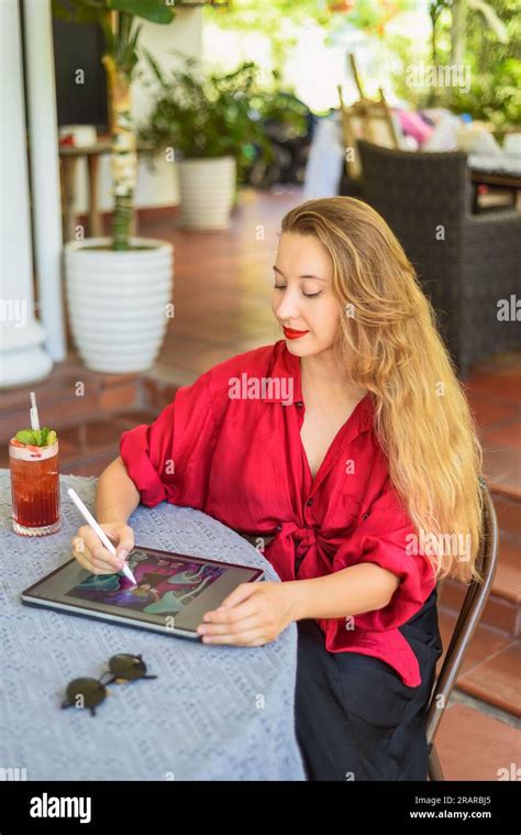 Beautiful Blonde Woman Artist And Illustrator Made An Idea About A Concept Of Her Drawing