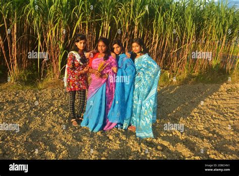 Close Up Of Four Indian Bengali Teenage Girls Wearing Saree Blouse