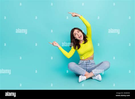 Full Length Portrait Of Positive Person Sit Floor Look Direct Fingers