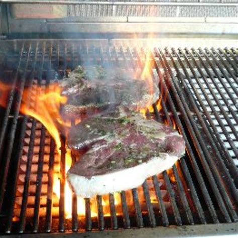 Grilled Porterhouse Steak Marinated In Garlic With Paprika Parmesan Butter