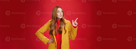 Wondered Curious Good Looking Redhead Woman In Coat Stopping On Way
